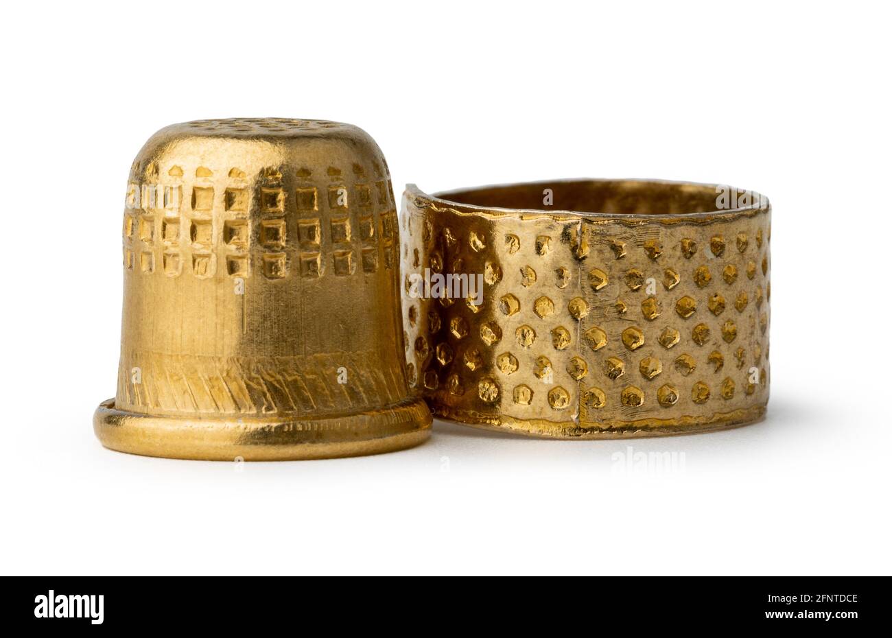 Metal sewing thimble isolated on white Stock Photo - Alamy