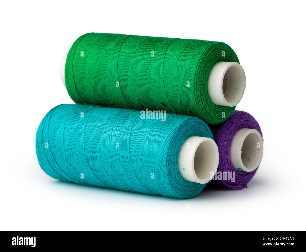 Color thread spool isolated on white background Stock Photo - Alamy