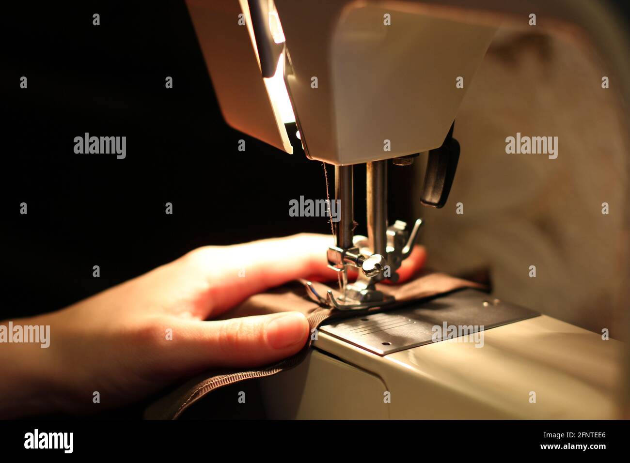 Sewing machine close up. Tailoring. Abstract photo Stock Photo - Alamy
