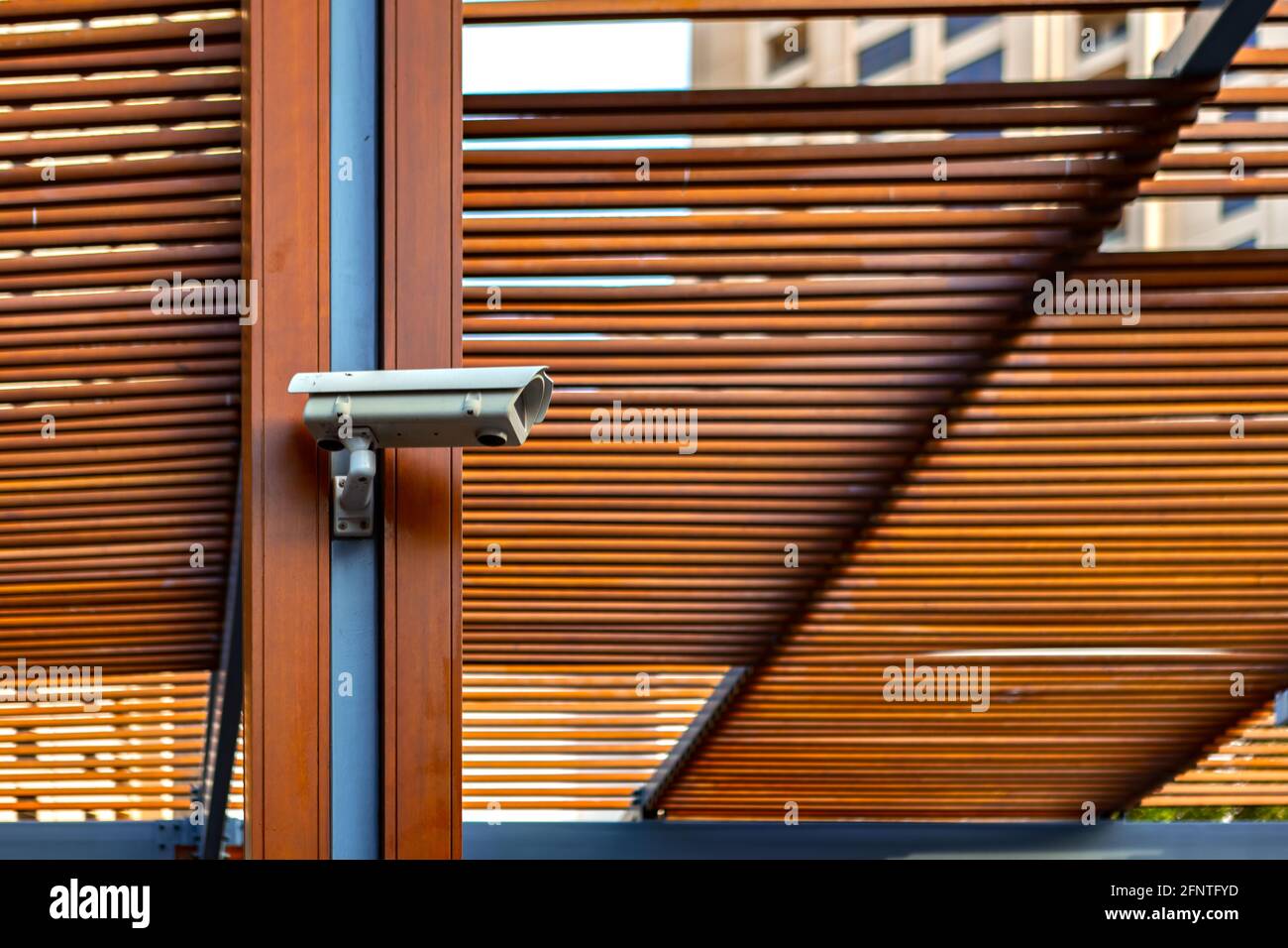 Security CCTV camera on facade of building Stock Photo - Alamy