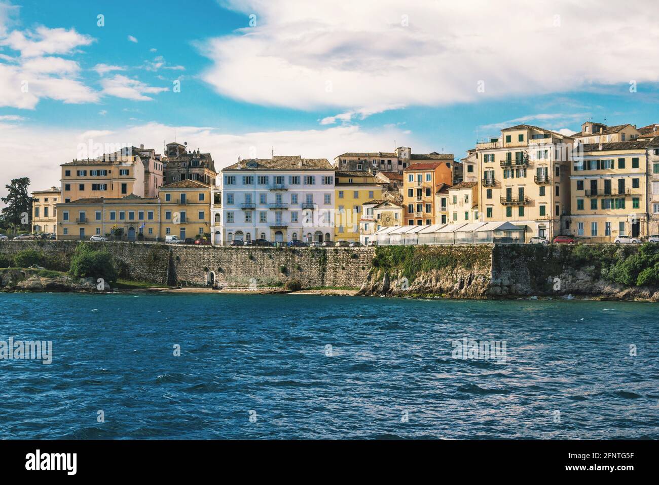Corfu Island/Greece- May 7, 2019: Kerkyra cityscape - sea bay with calm ...
