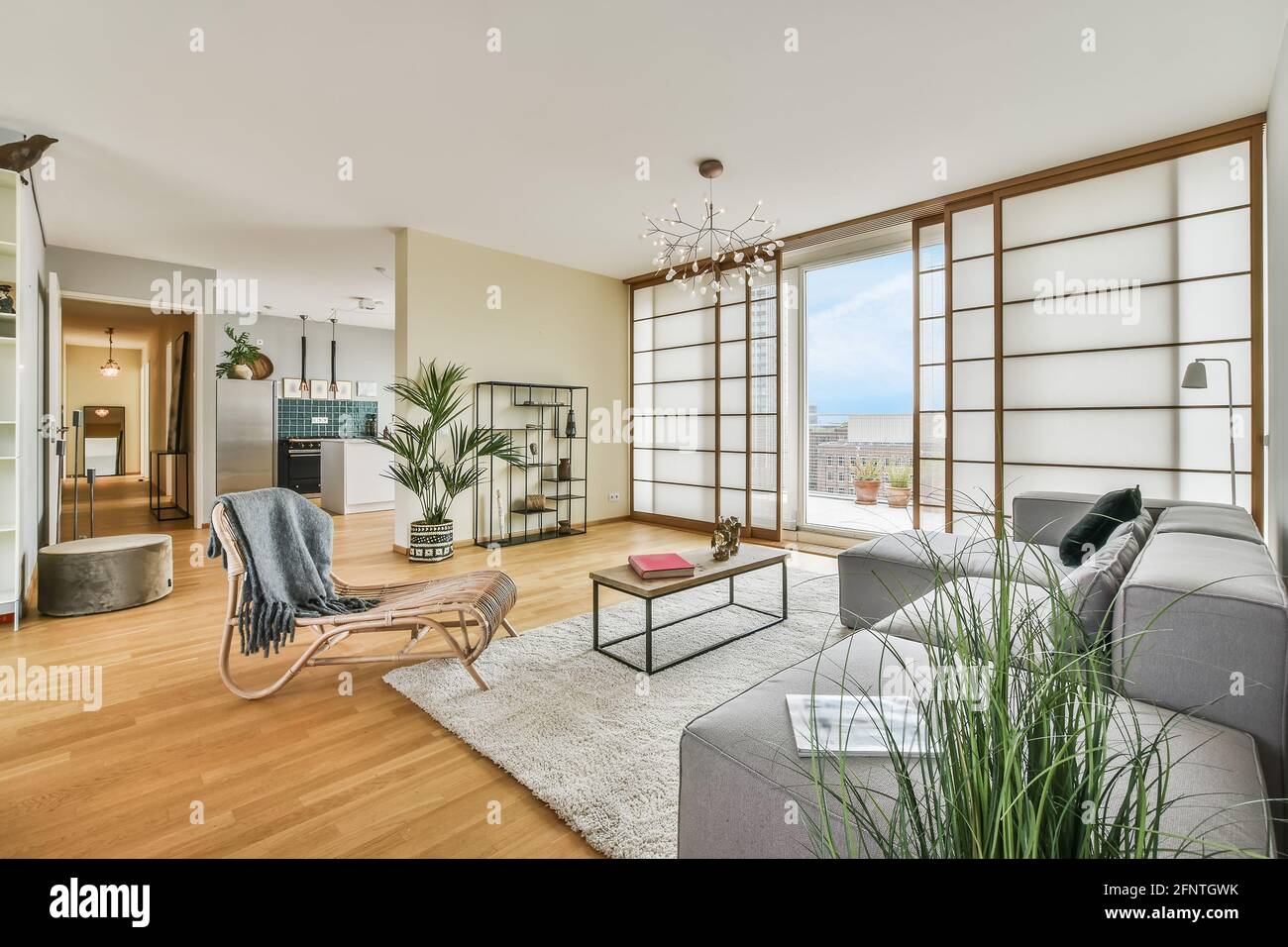 Interior of spacious modern living room with glass terrace door in ...