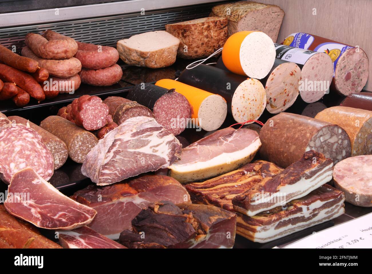 Sausage counter in a butcher's shop Stock Photo - Alamy