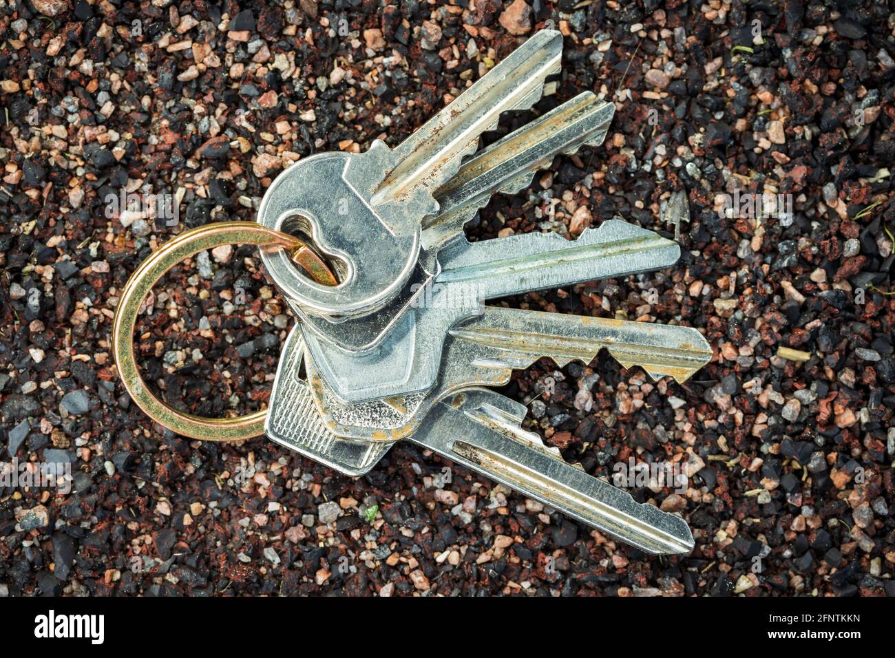 a bunch of lost keys lies on the ground. View from above. High quality ...