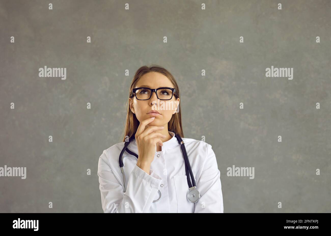 Reflective thinking nurse hi-res stock photography and images - Alamy