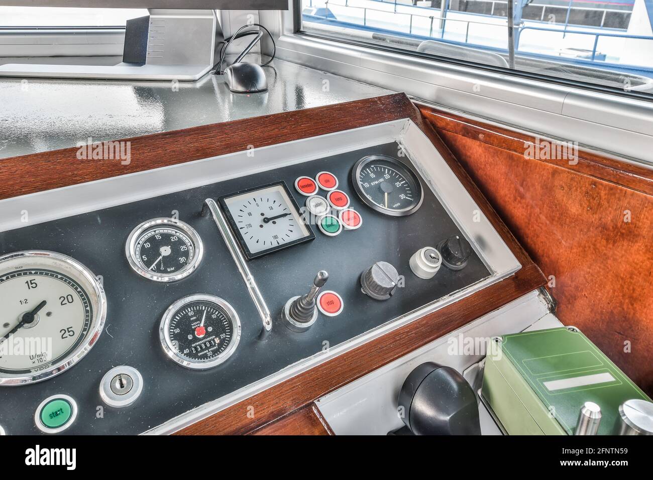 From above radio equipment and control buttons on dashboard in cockpit ...