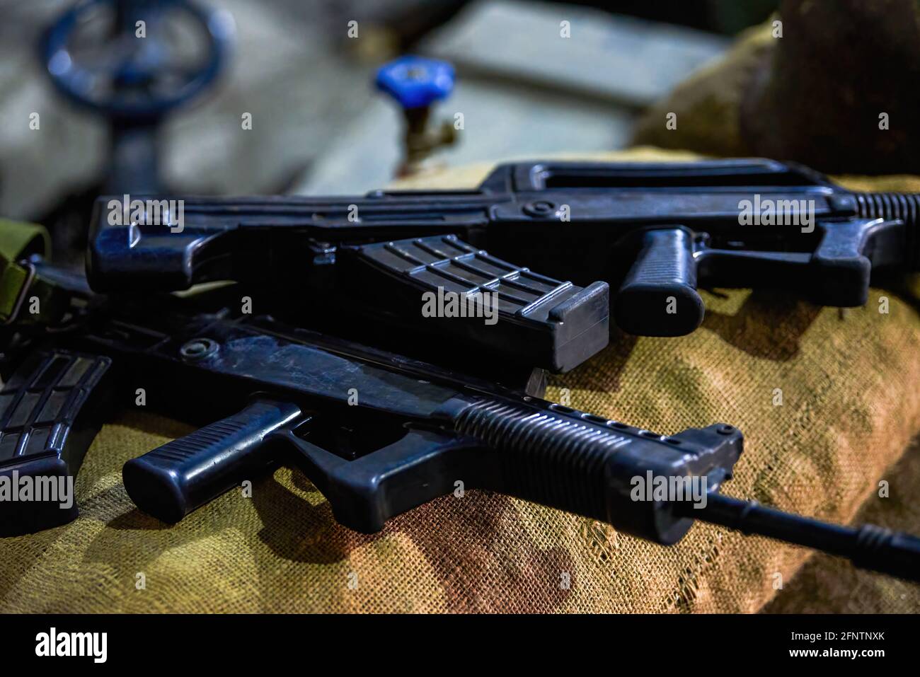 A close-up of the assault rifle model in the military summer camp Stock ...