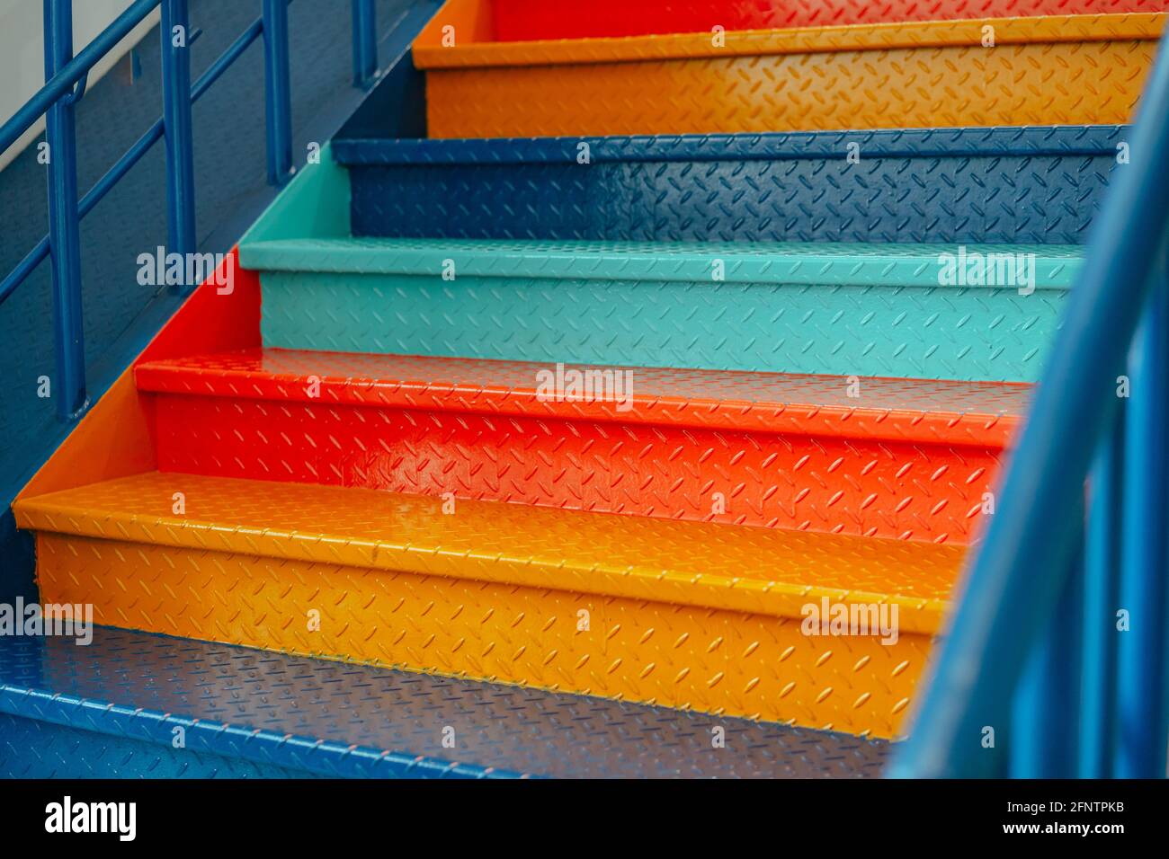 Stairs painted in bright colors, stairs background Stock Photo - Alamy