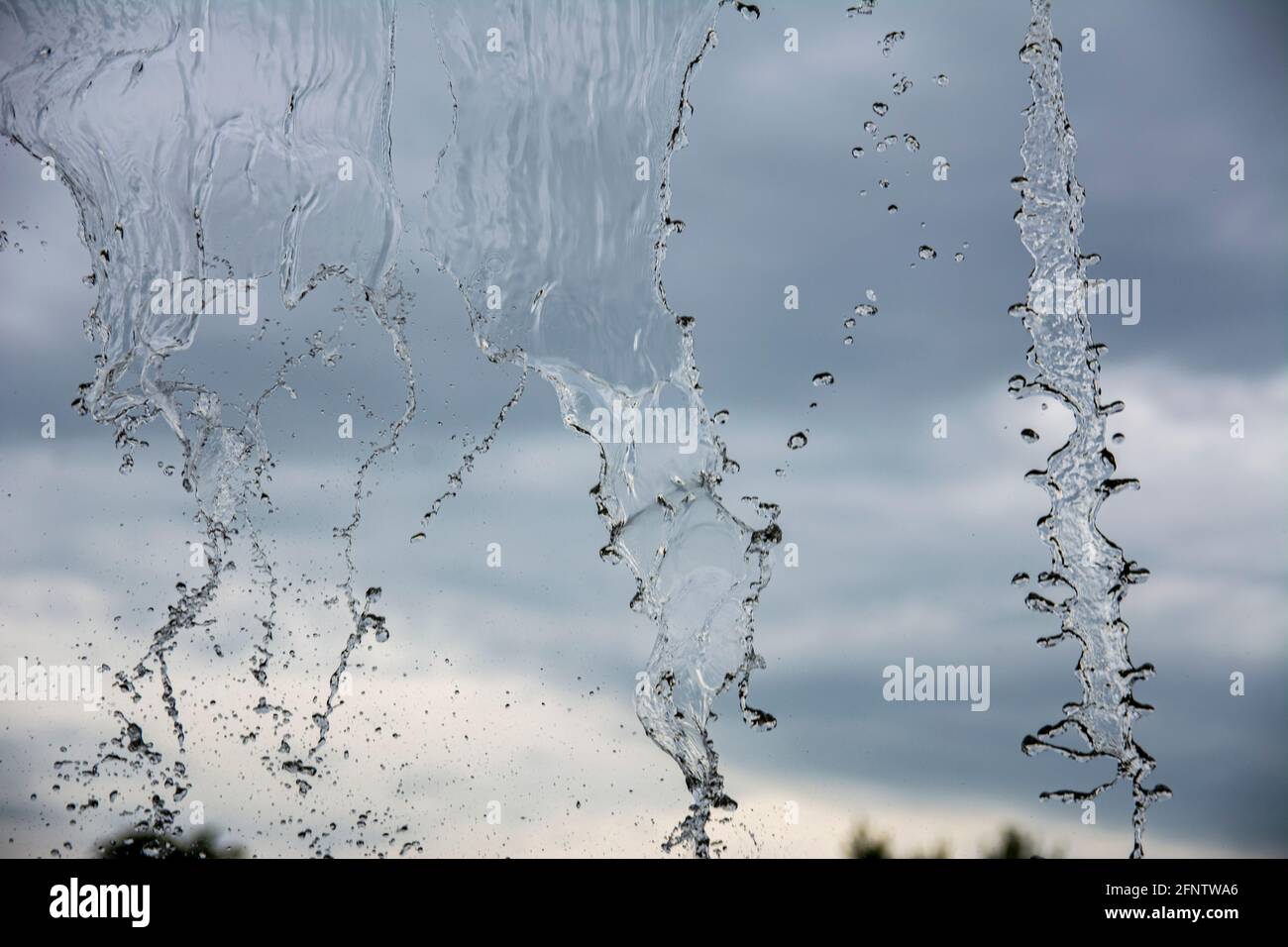 waterfall against the sky. the falling water is frozen in the picture ...