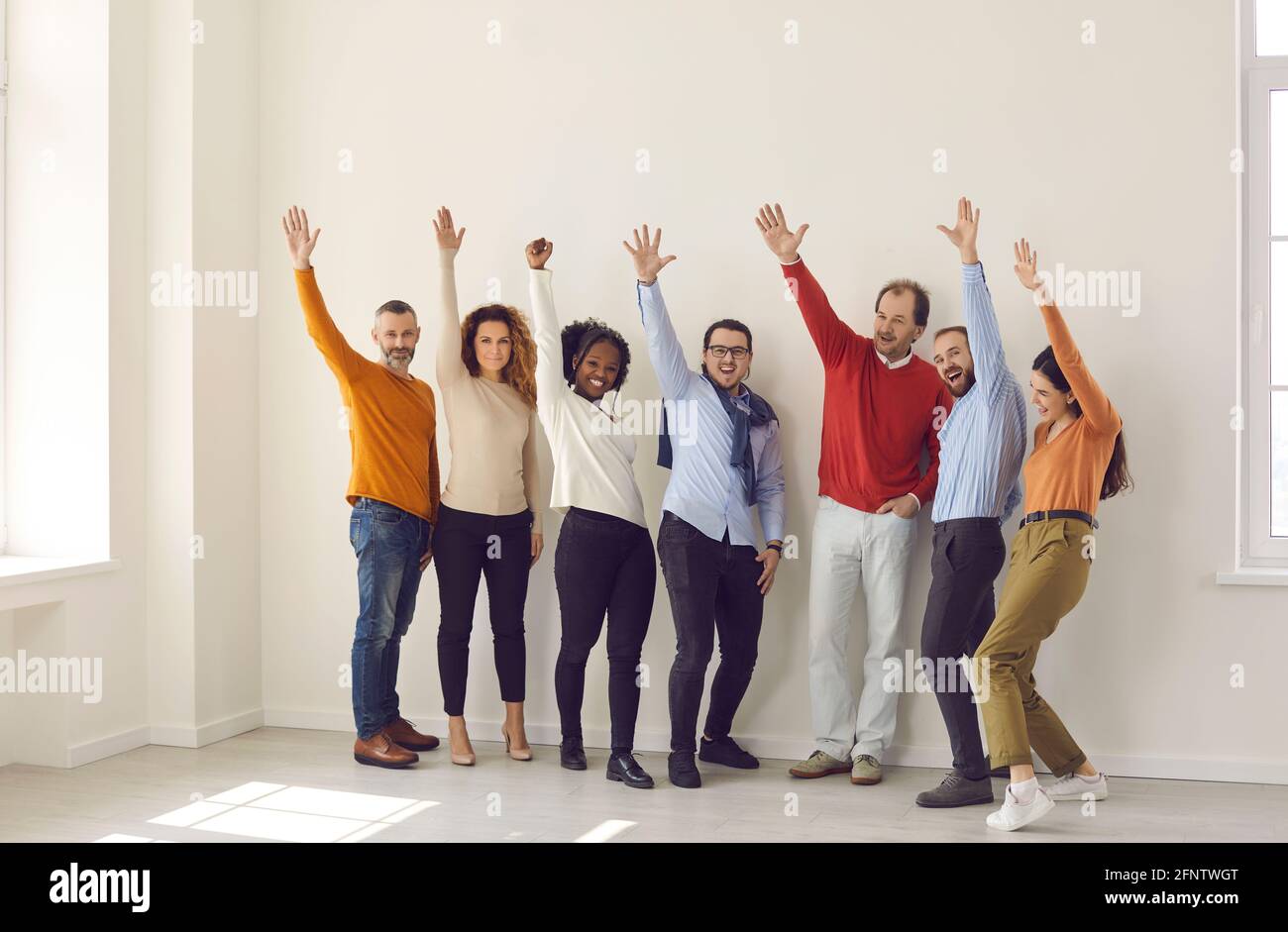 Raising hands voting hi-res stock photography and images - Alamy