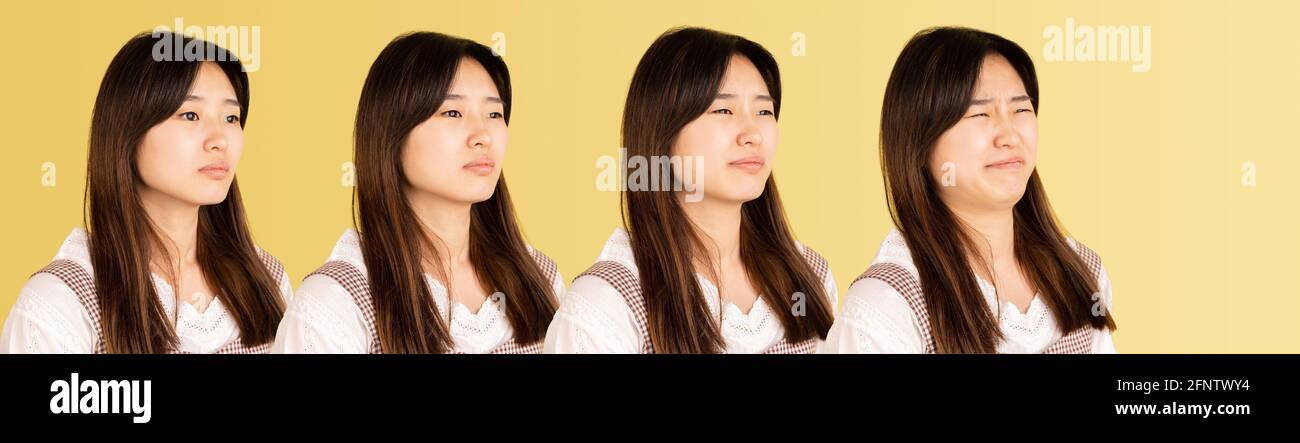 Evolution of emotions. Asian young woman's portrait on yellow studio ...