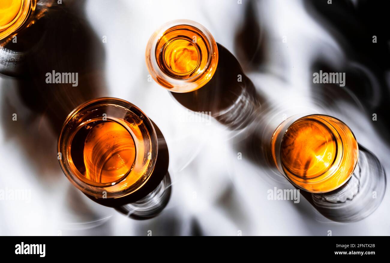 Strong alcoholic drinks, spirits and distillates in glasses: vodka ...