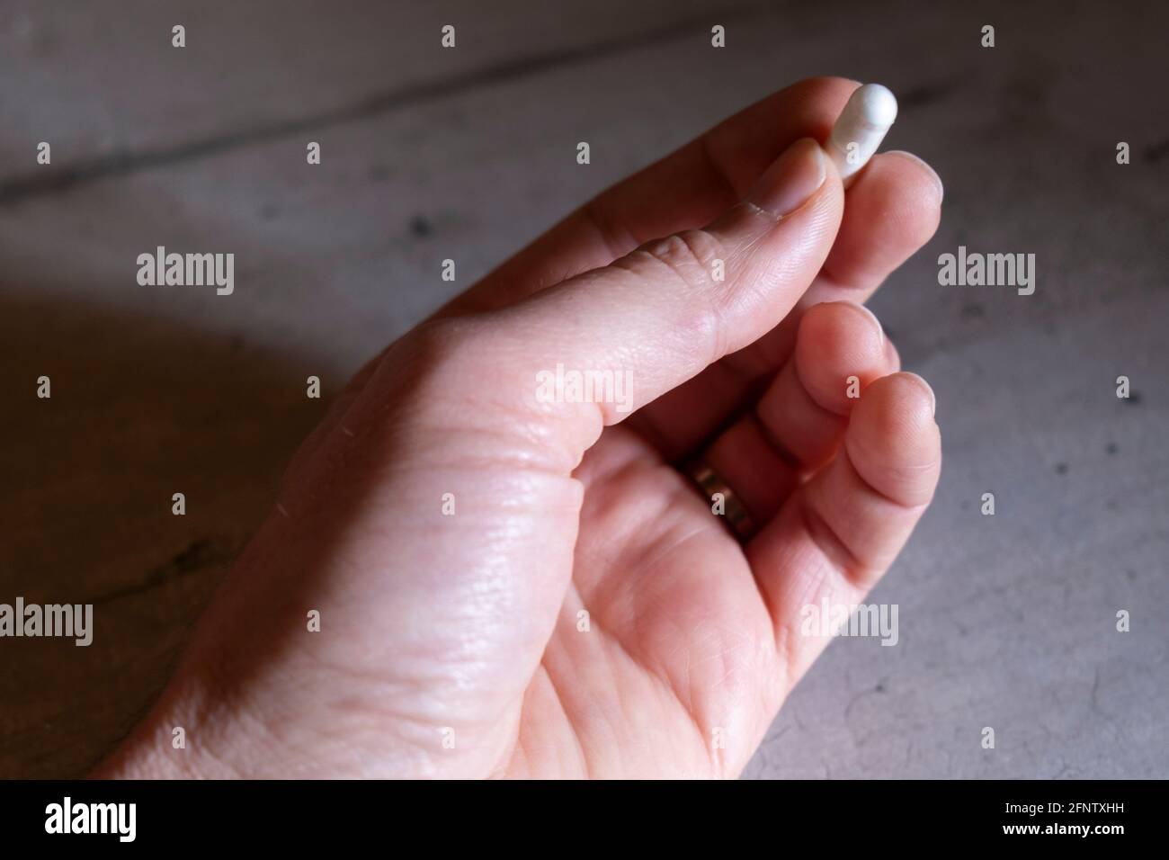 Taking the blue pill hi-res stock photography and images - Alamy