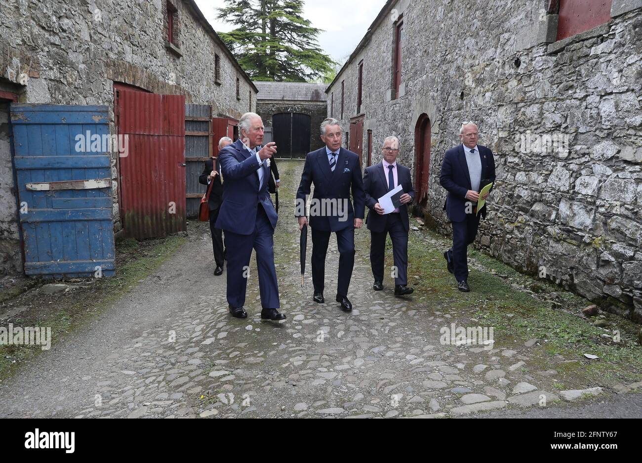The Prince of Wales (left) with Lord Caledon (centre) during his visit ...