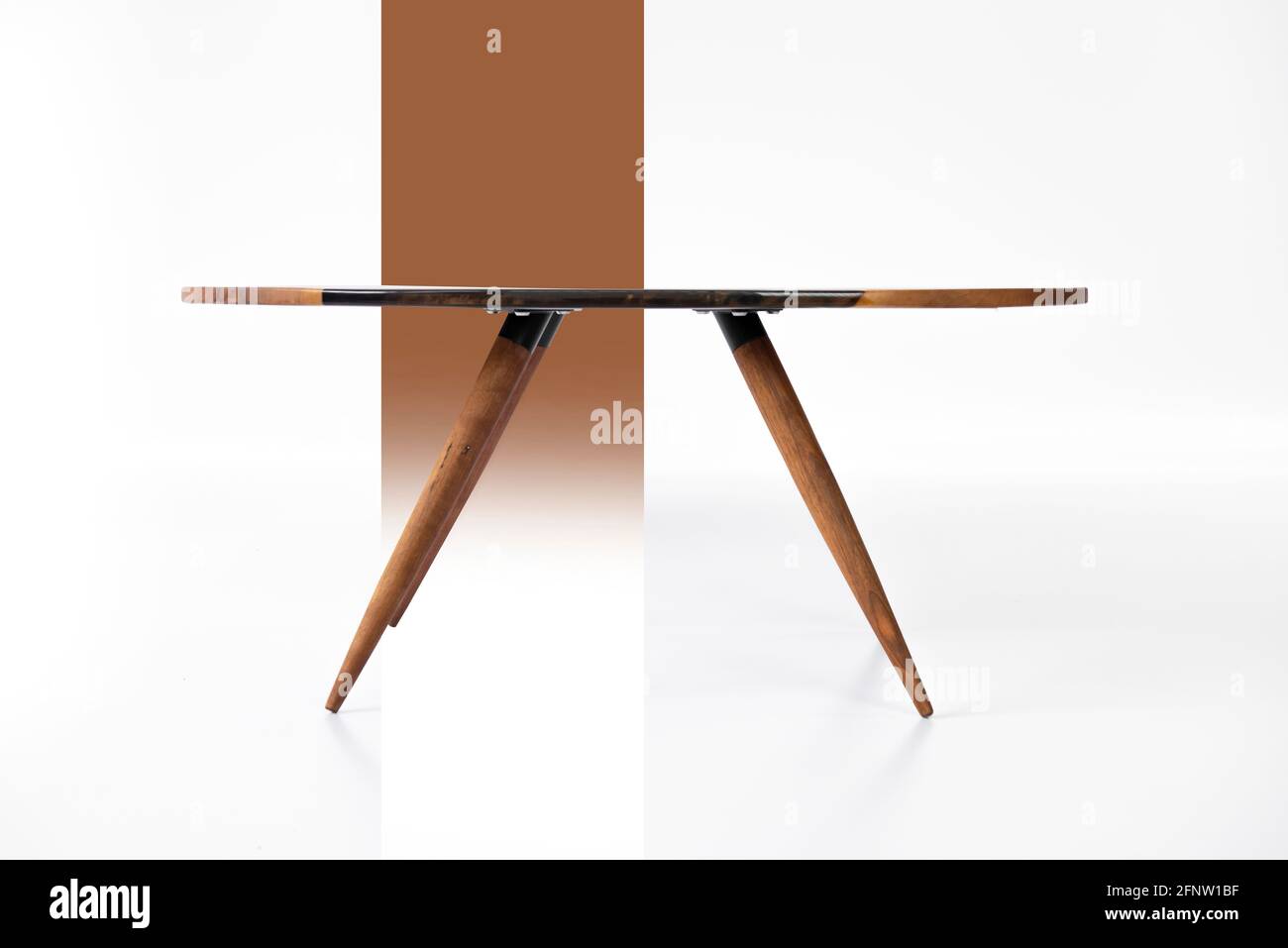 Modern handmade table made from walnut tree Stock Photo - Alamy
