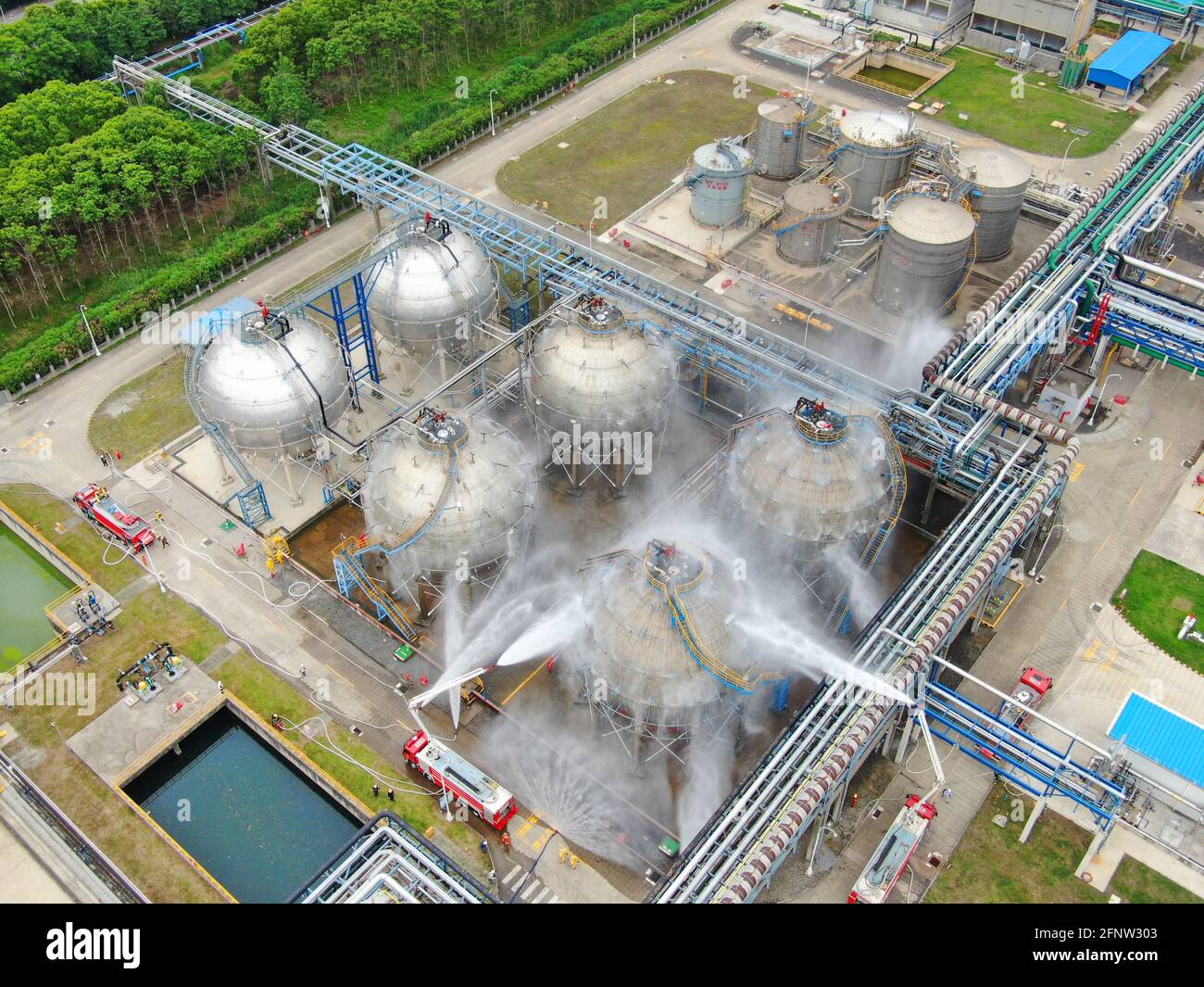 A fire drill of the leakage of butadiene spherical tank is held in ...