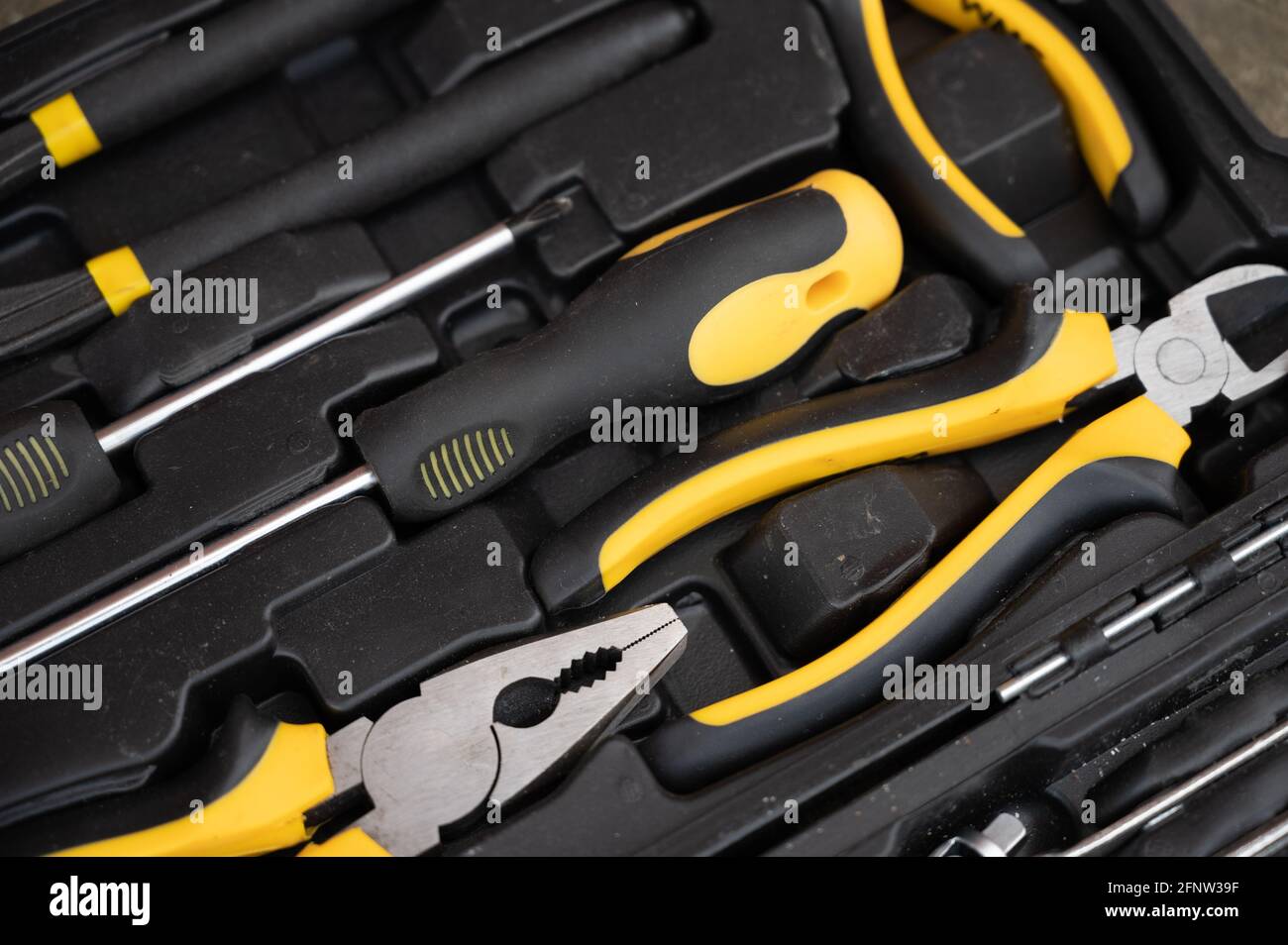 A set of black and yellow tools Stock Photo - Alamy