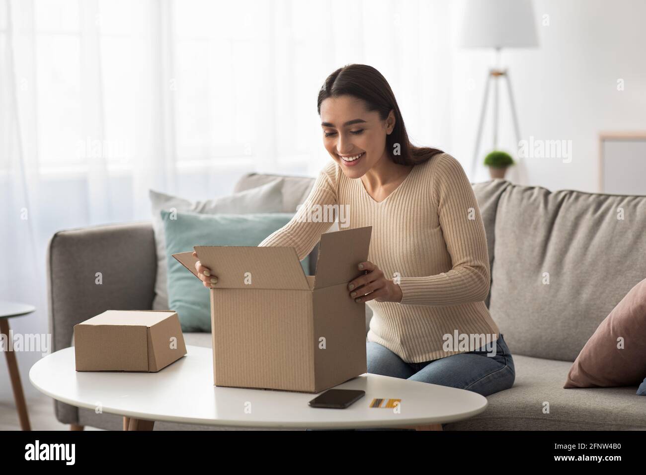 Online shopping and home delivery during covid-19 lockdown Stock Photo - Alamy