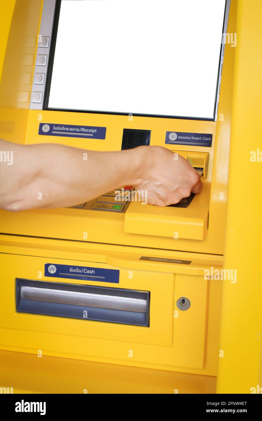 Man pressing password number on ATM machine Stock Photo - Alamy
