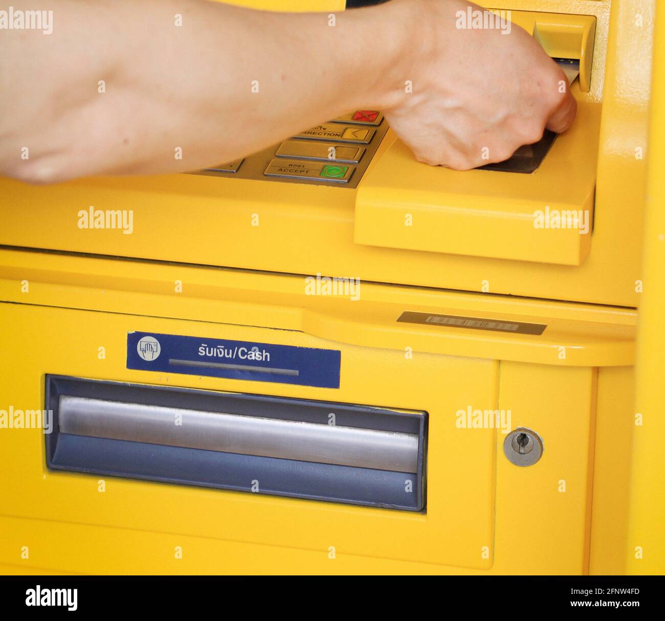 Man pressing password number on ATM machine Stock Photo - Alamy