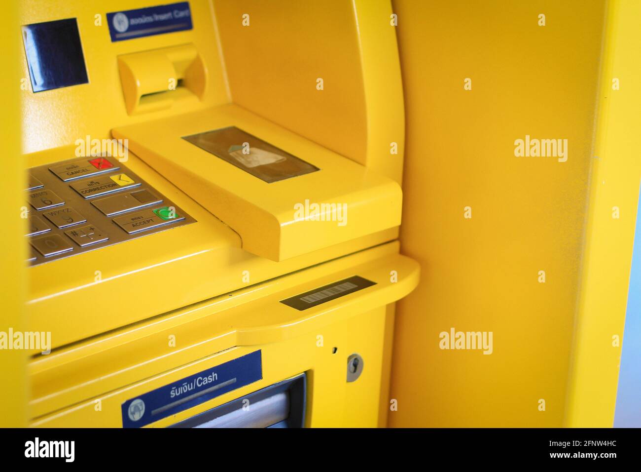 Man pressing password number on ATM machine Stock Photo - Alamy