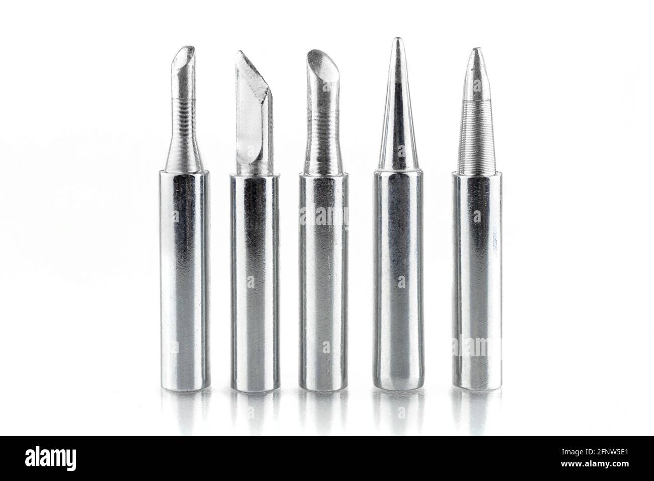 Set of soldering iron tips isolated on a white background, close-up ...