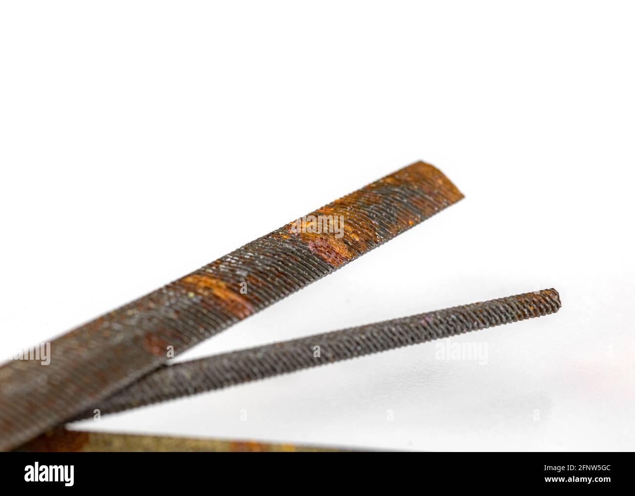 Close up of old and rusty rasp tool equipment on a white background ...