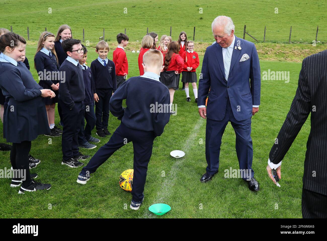 The Prince of Wales in conversation with local school children at ...
