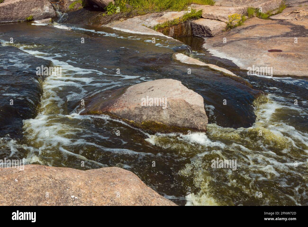 The murmuring waters of the Tokovsky waterfall in Ukraine. This is the ...