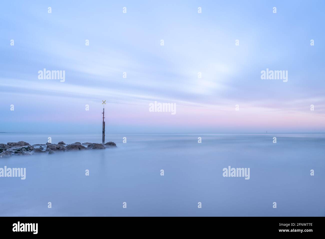 Flat sea with rocks hi-res stock photography and images - Alamy