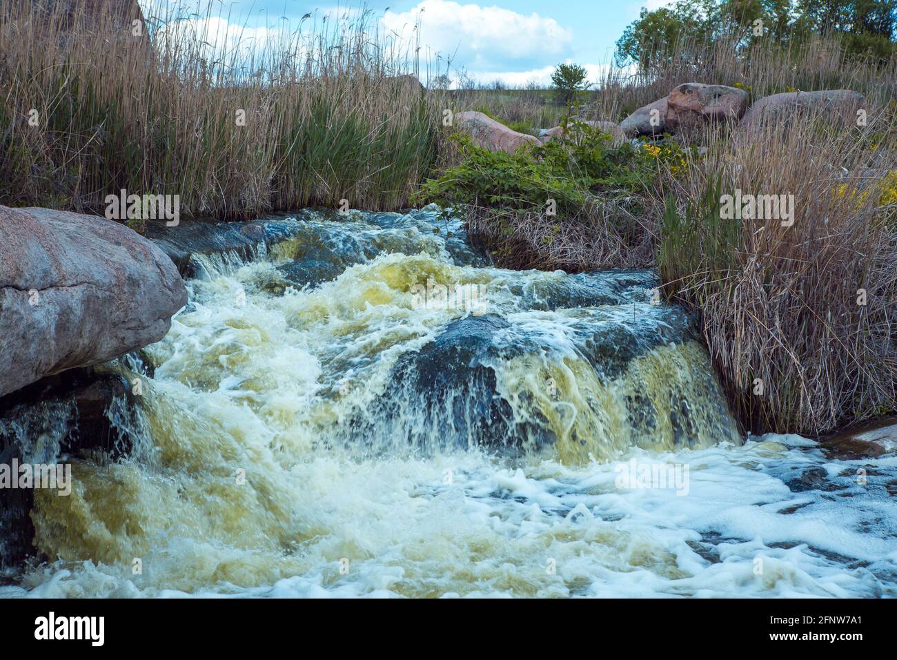 The murmuring waters of the Tokovsky waterfall in Ukraine. This is the ...