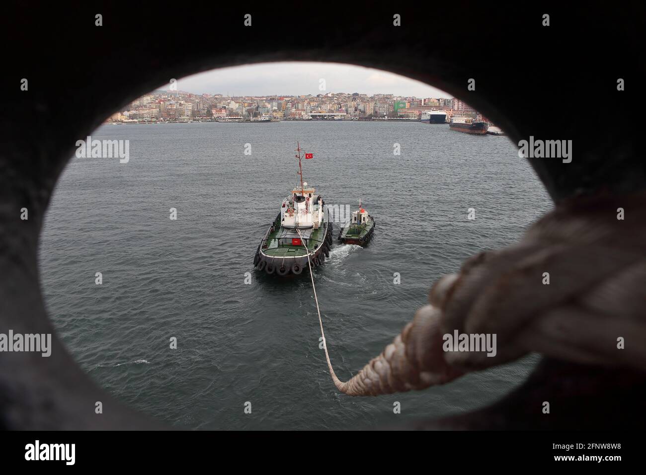 tug boats and vessel during towing Stock Photo - Alamy