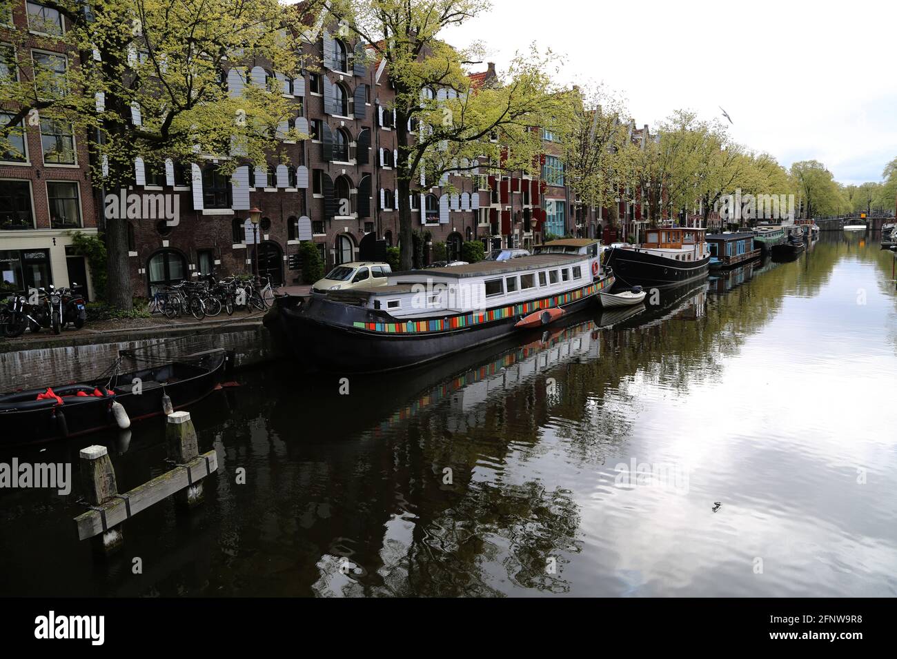 One of the characteristic canals of the city of Amsterdam Stock Photo ...