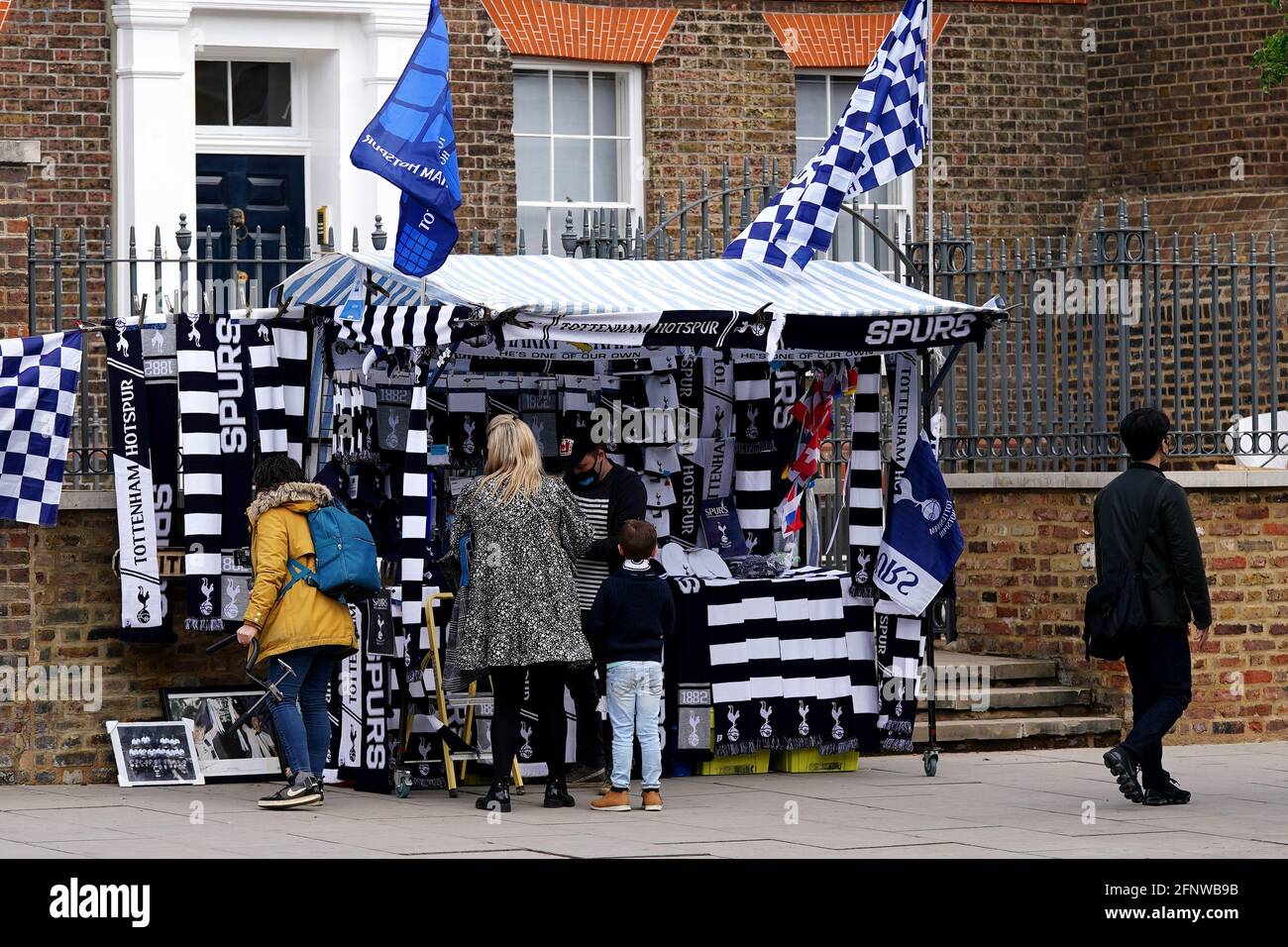 Tottenham Hotspur fans at a merchandise stand before the Premier League ...
