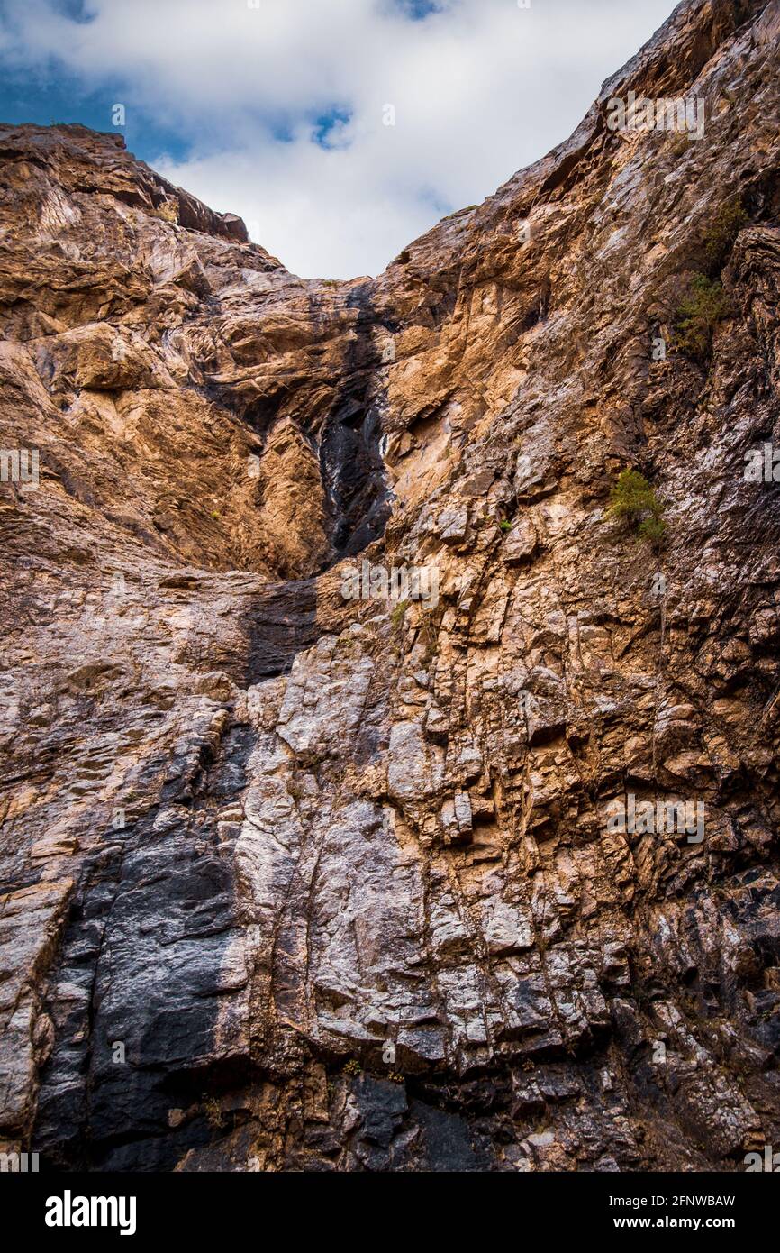 A fan waterfall that gets wider at the base of its descent near ...