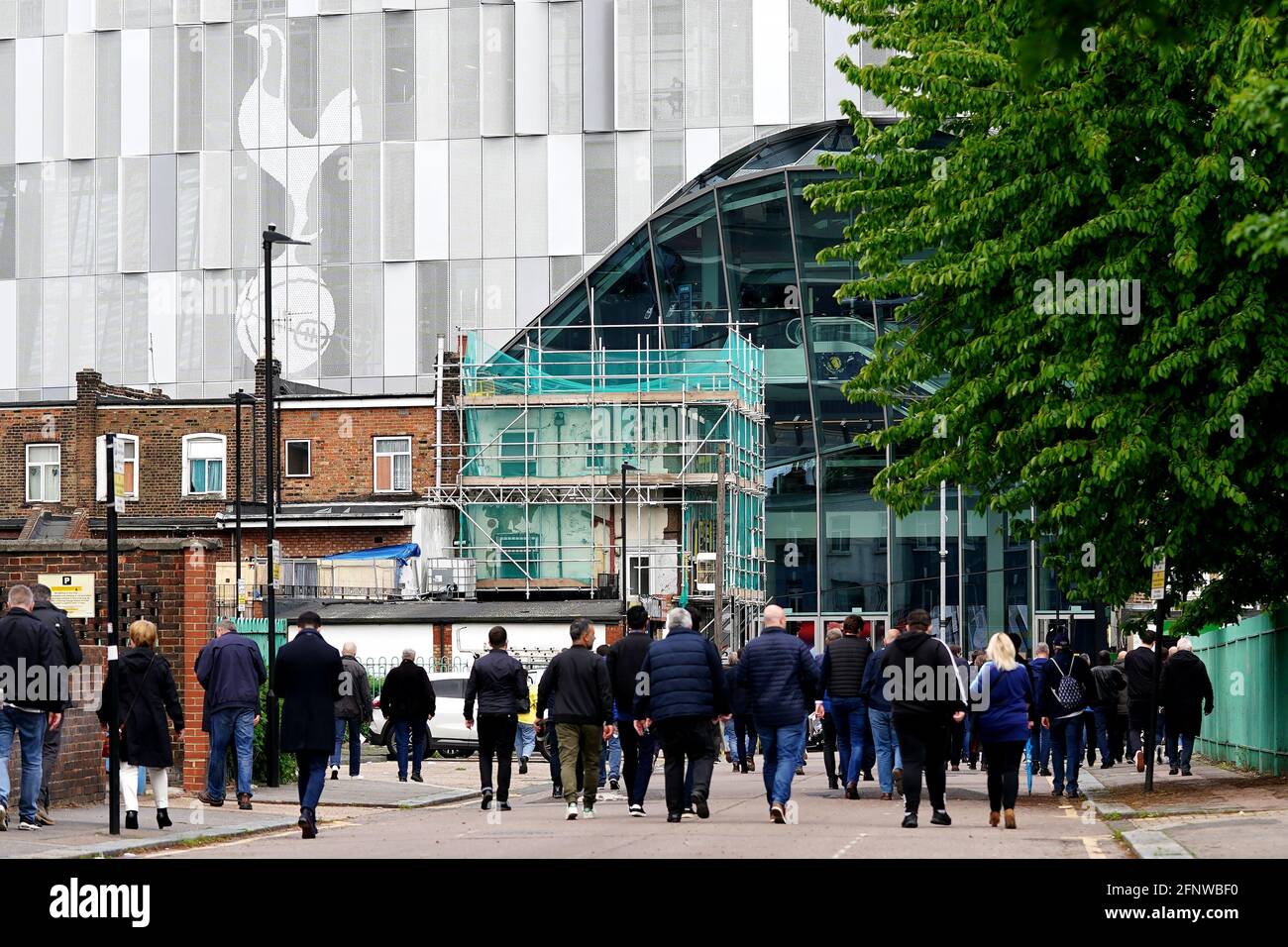Tottenham Hotspur fans arrive at the stadium before the Premier League ...
