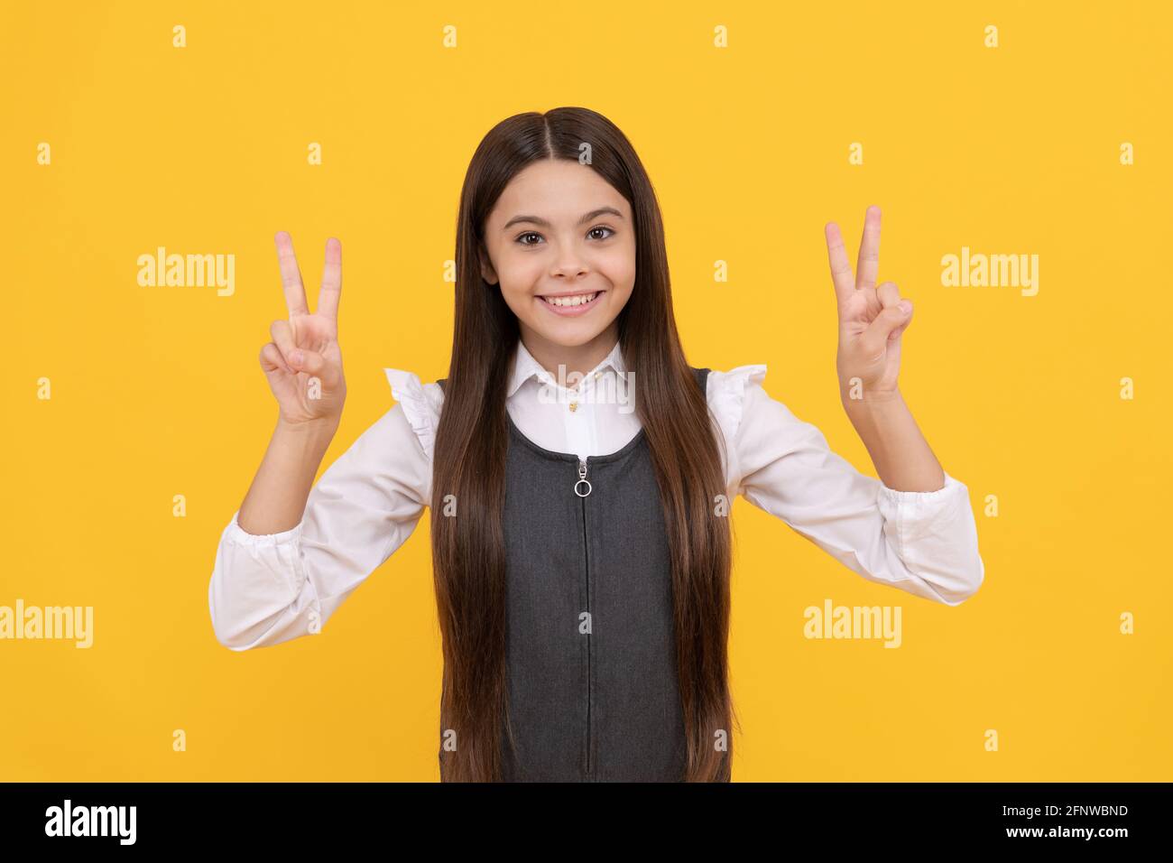 Victory in learning. Happy kid give double V signs. Pupil achievement ...