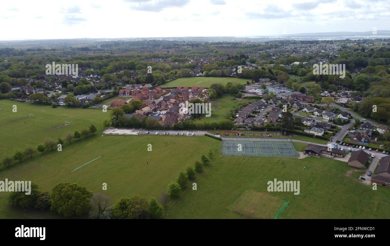 Aerial view of playing fields, trees and new housing development Stock ...