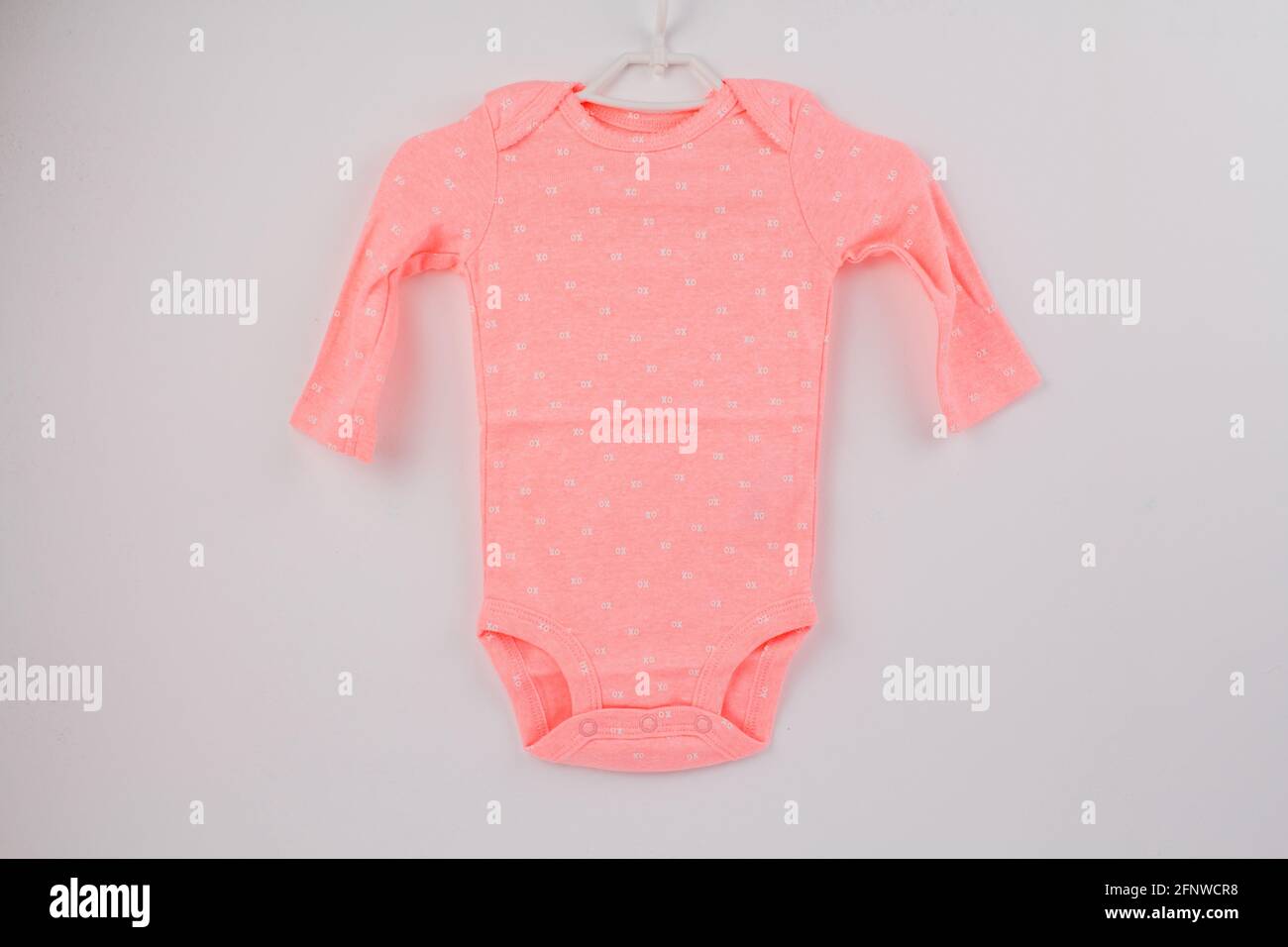 pink body for small child on a white background Stock Photo - Alamy