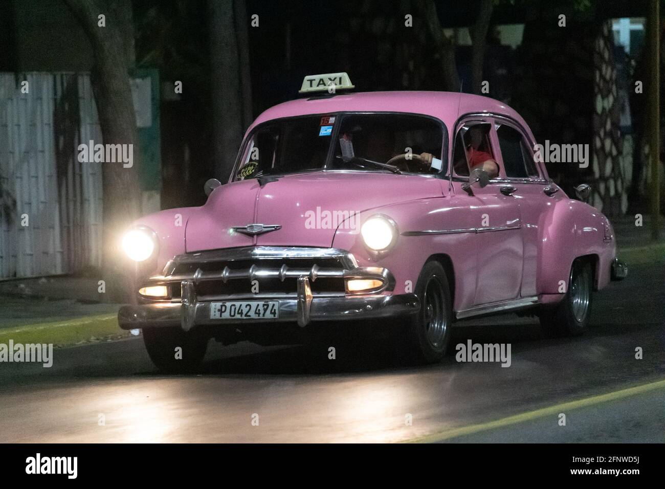 Old car at night driving hi-res stock photography and images - Alamy