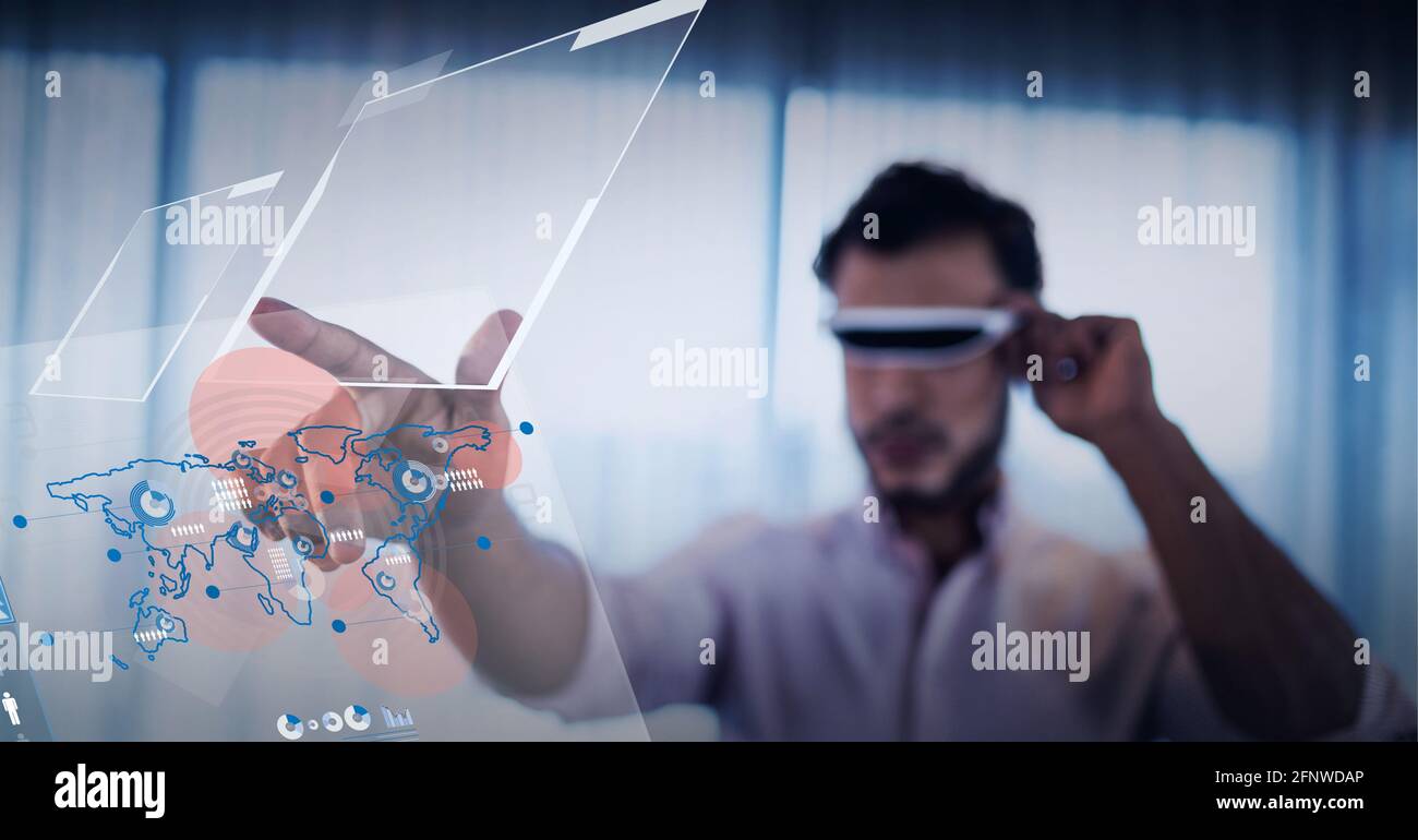Composition of man wearing vr headset touching interactive screen with ...
