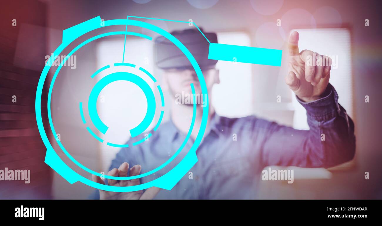 Composition of businessman wearing vr headset touching digital screen ...