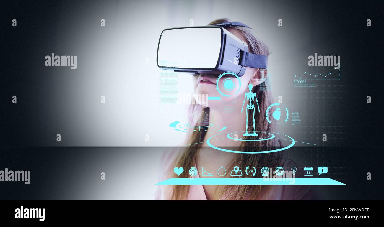 Composition of businesswoman wearing vr headset and screen with data ... Composition of businesswoman wearing vr headset and screen with data ...