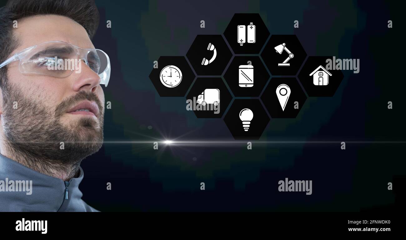 Composition of man with productivity digital icons on screen Stock ...