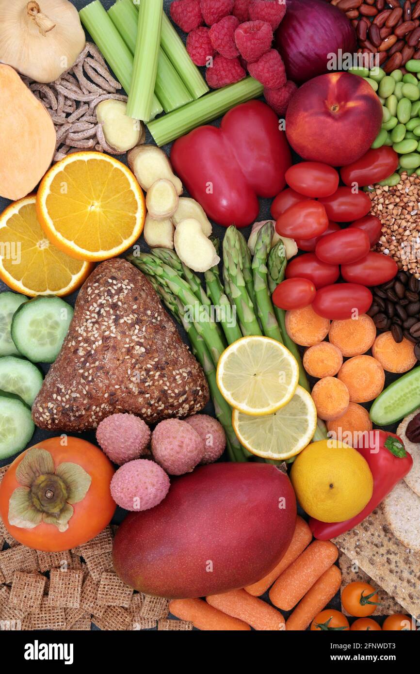 Health food for healthy eating with fruit, vegetables, grains, cereals ...