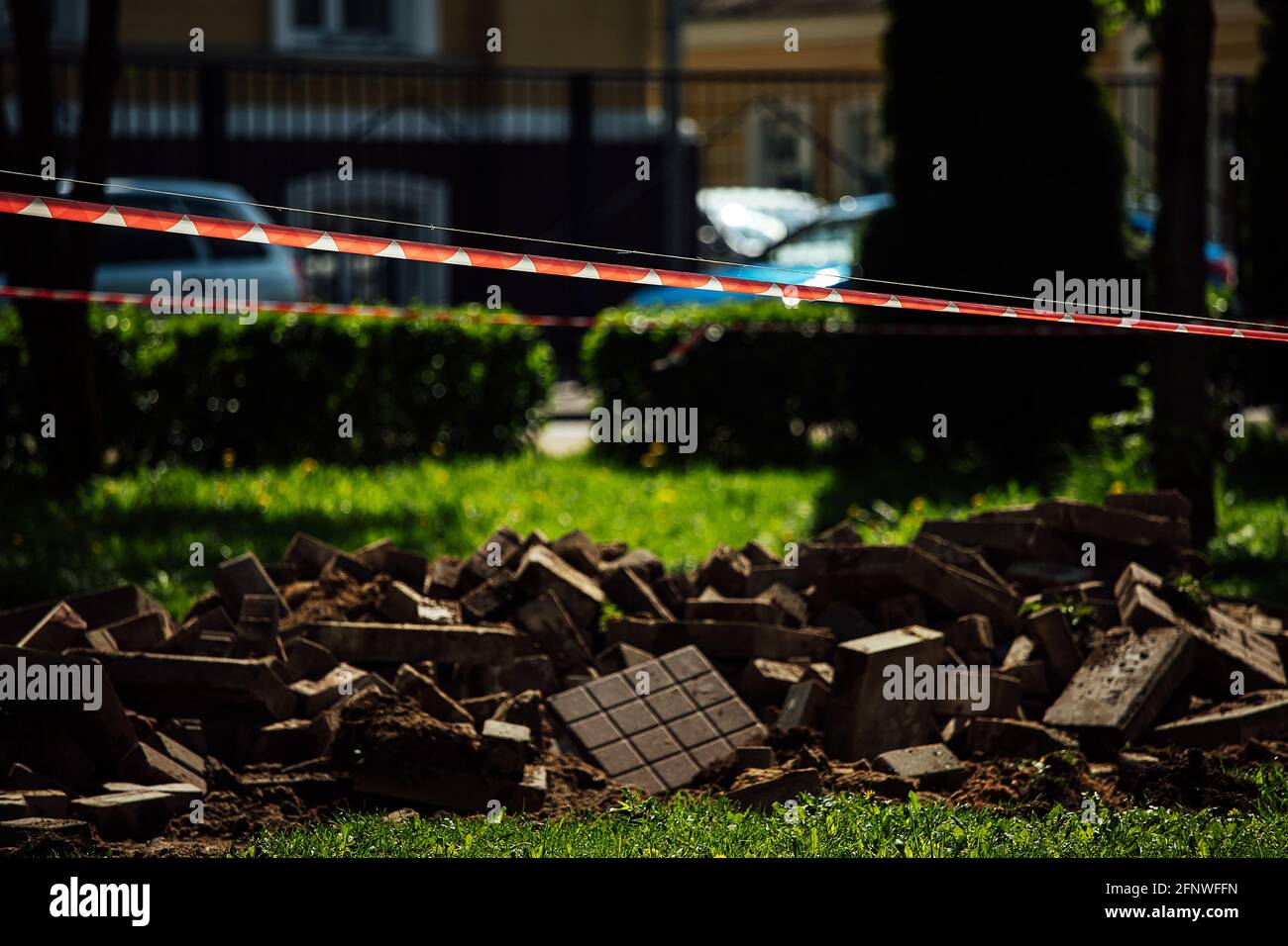 a warning ribbon prohibits passage. cordon tape around the dangerous ...