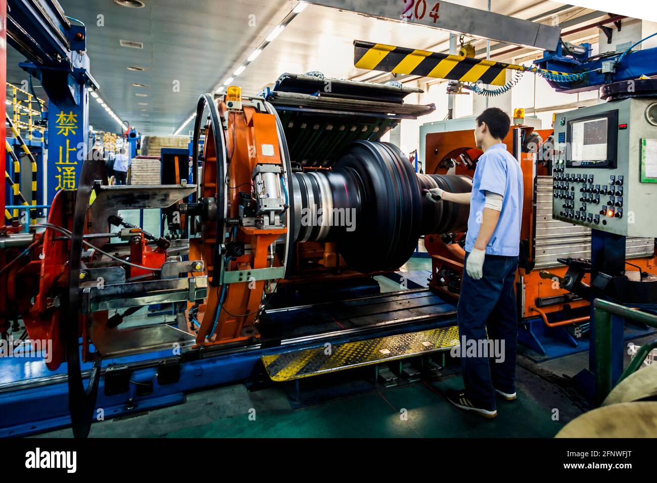 Chinese workers factory hi-res stock photography and images - Alamy