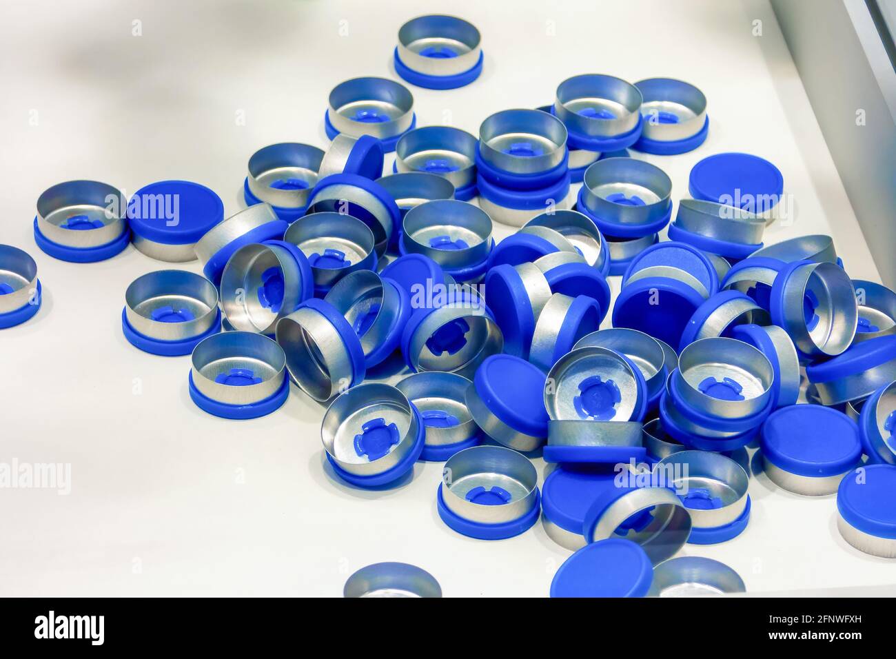 New pharmaceutical caps, metal and plastic, close-up view Stock Photo ...