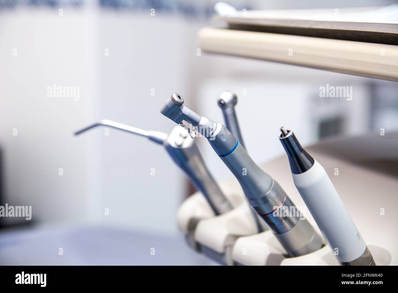 Different dental tools in the dental office. Dental chair instruments ...