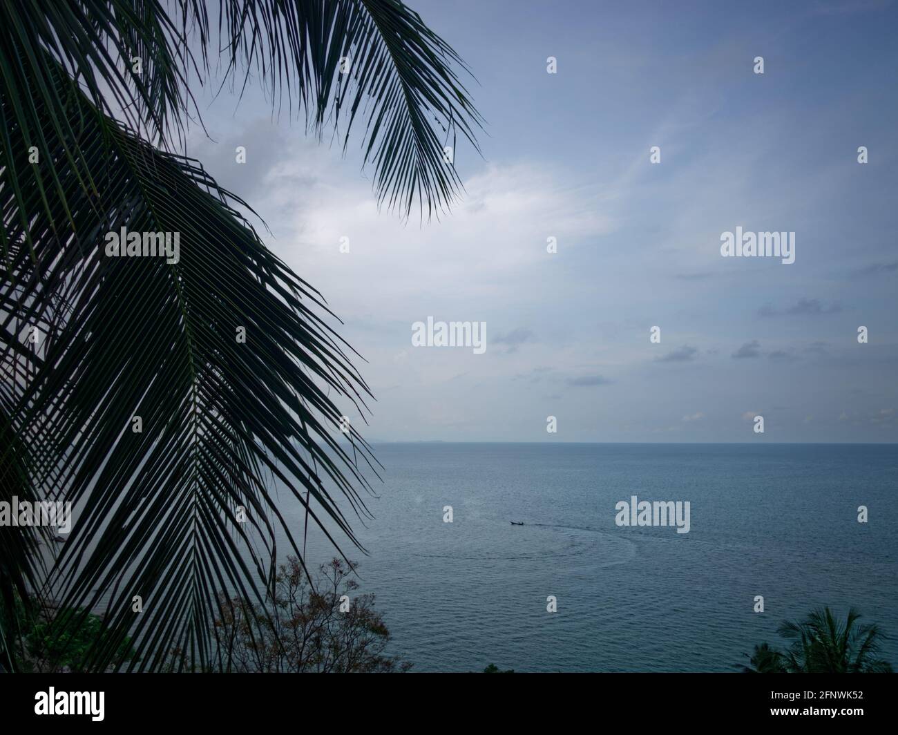 Calmful ocean beach dusk with deep blue sky and breezing waves in Kanom ...
